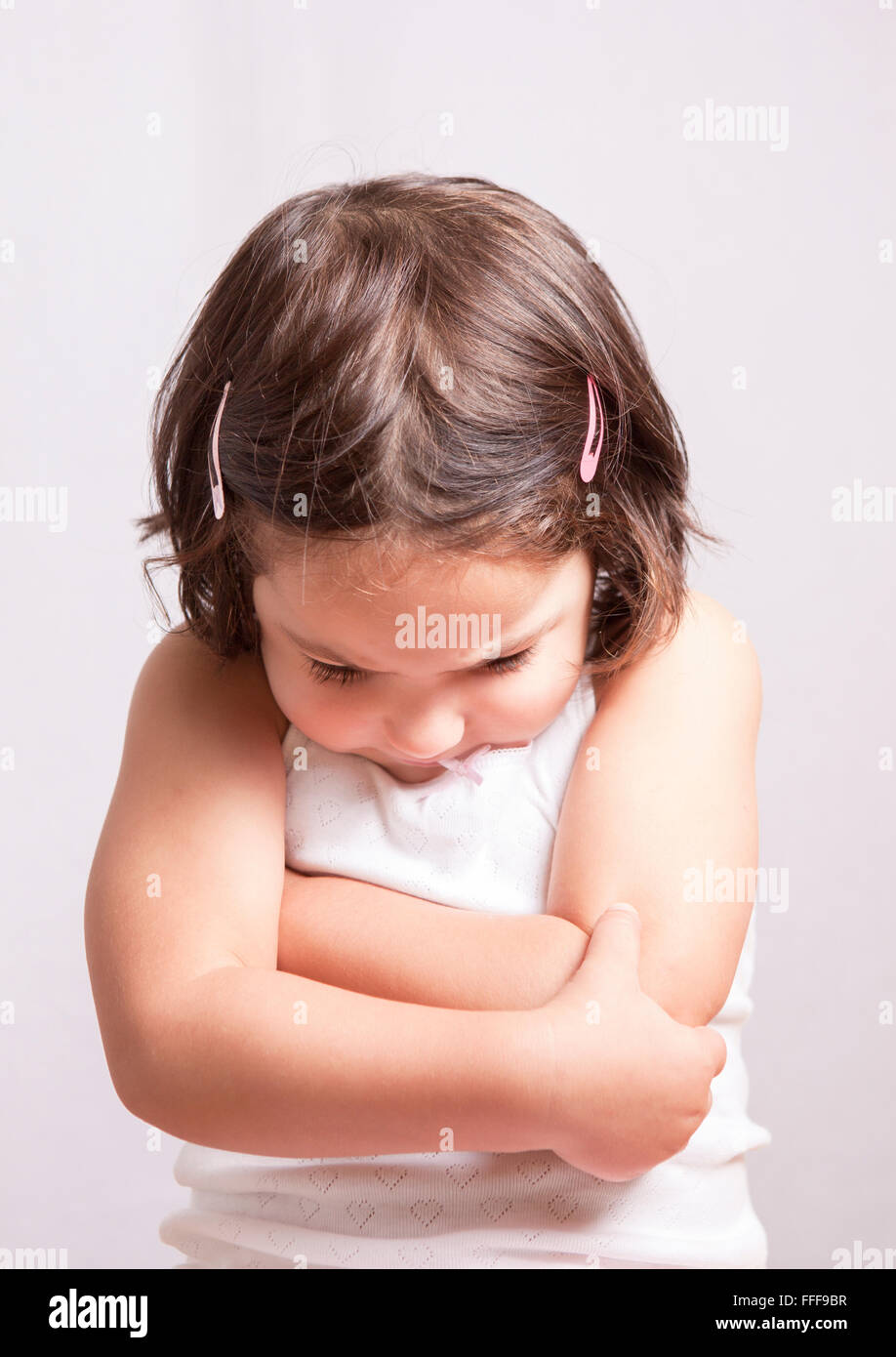 Angry Three Years Old Little Girl Sulking And Pouting Isolated Over angry-three-years-old-little-girl-sulking-and-pouting-isolated-over