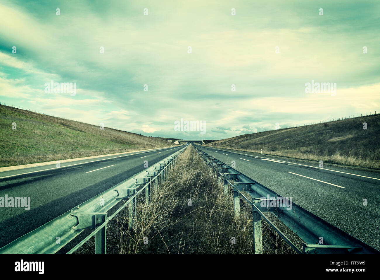 Vintage photo. Highway road without traffic in daylight Stock Photo - Alamy