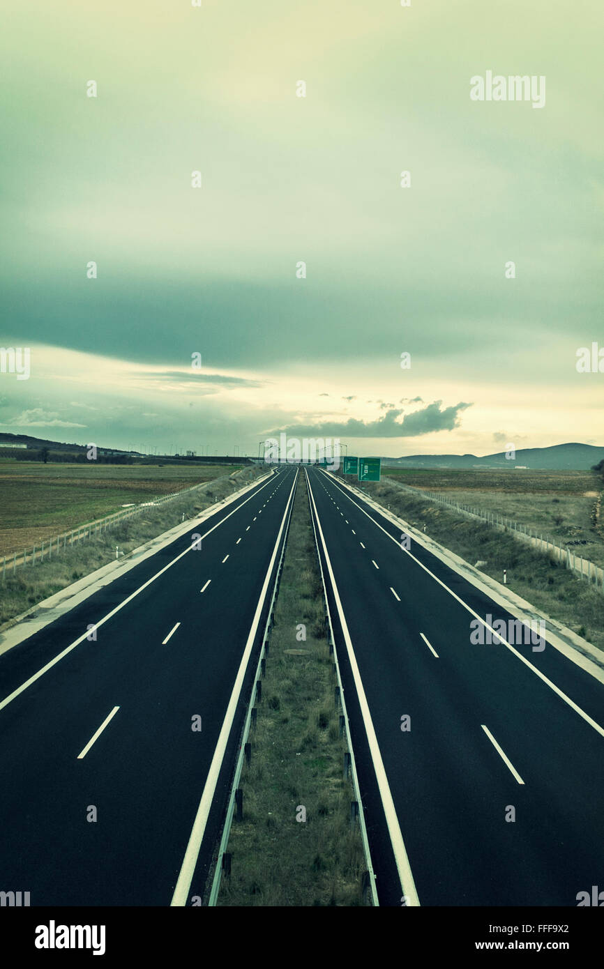 Vintage photo. Highway road without traffic in daylight Stock Photo - Alamy