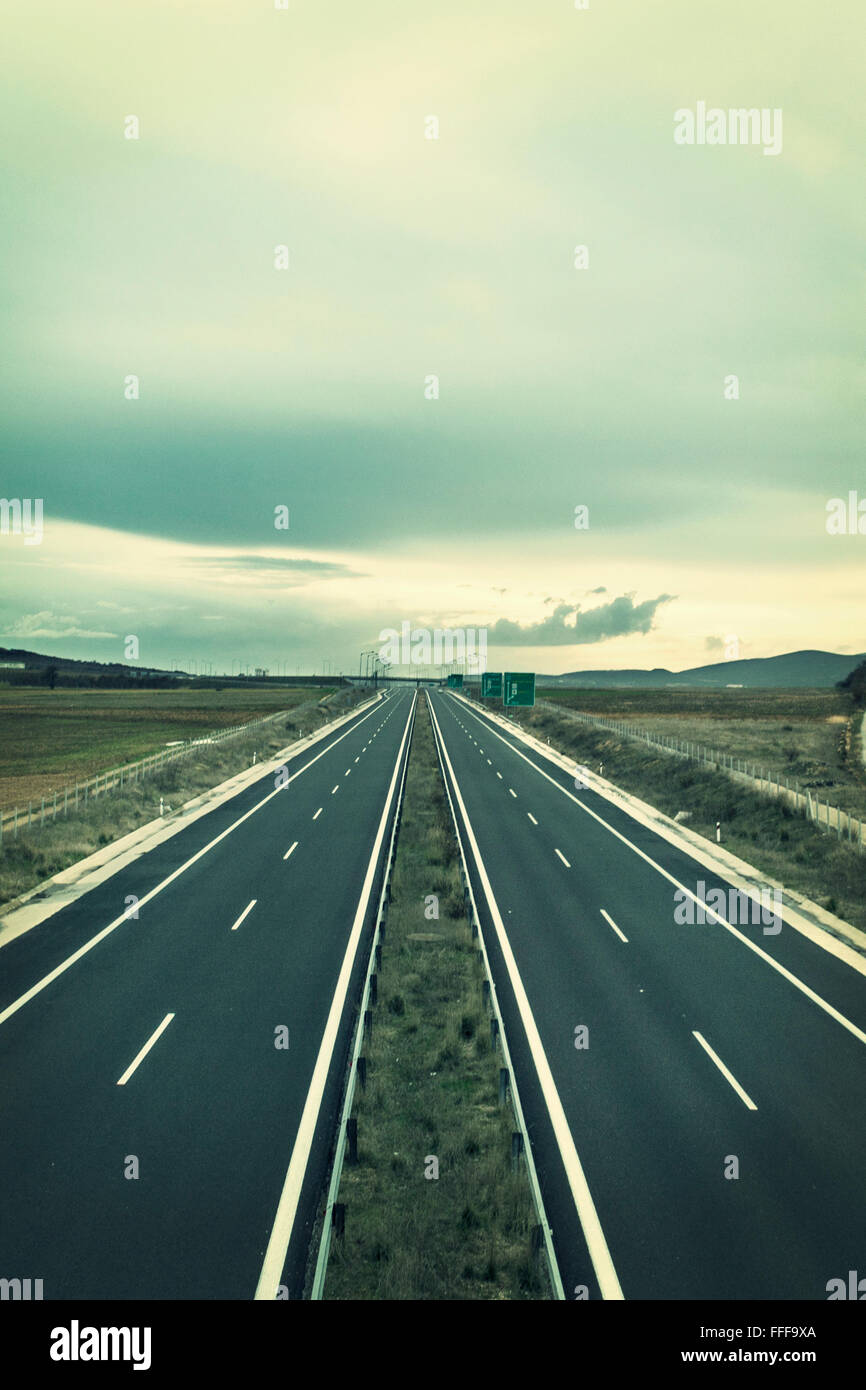 Vintage photo. Highway road without traffic in daylight Stock Photo - Alamy