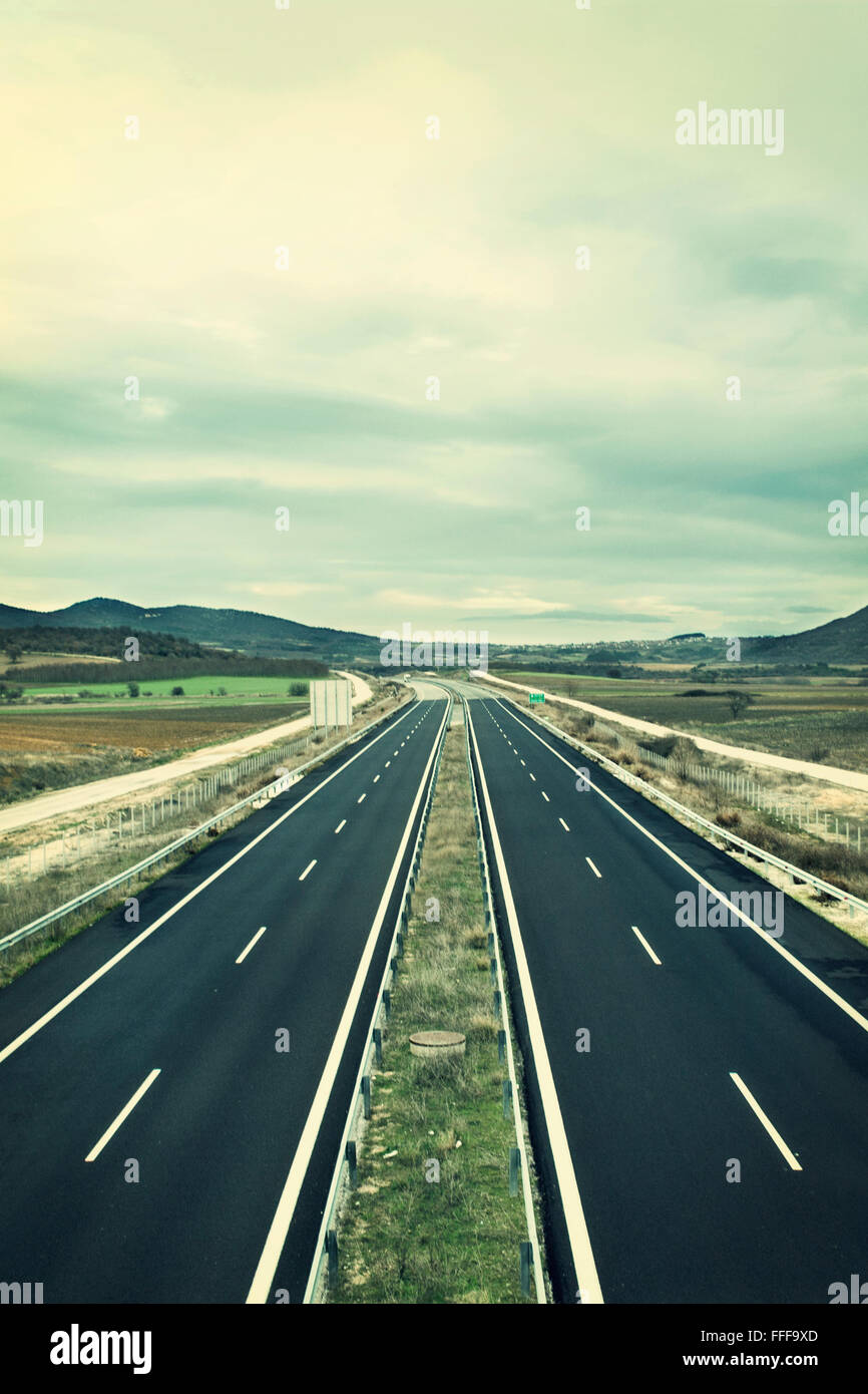 Vintage photo. Highway road without traffic in daylight Stock Photo - Alamy