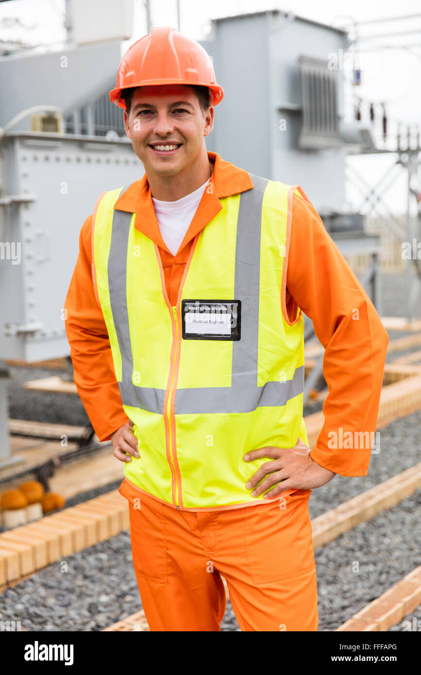 portrait of happy electrical engineer in substation Stock Photo - Alamy