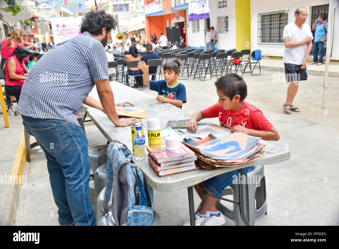 Children making art projects at a local government cultural event in ...