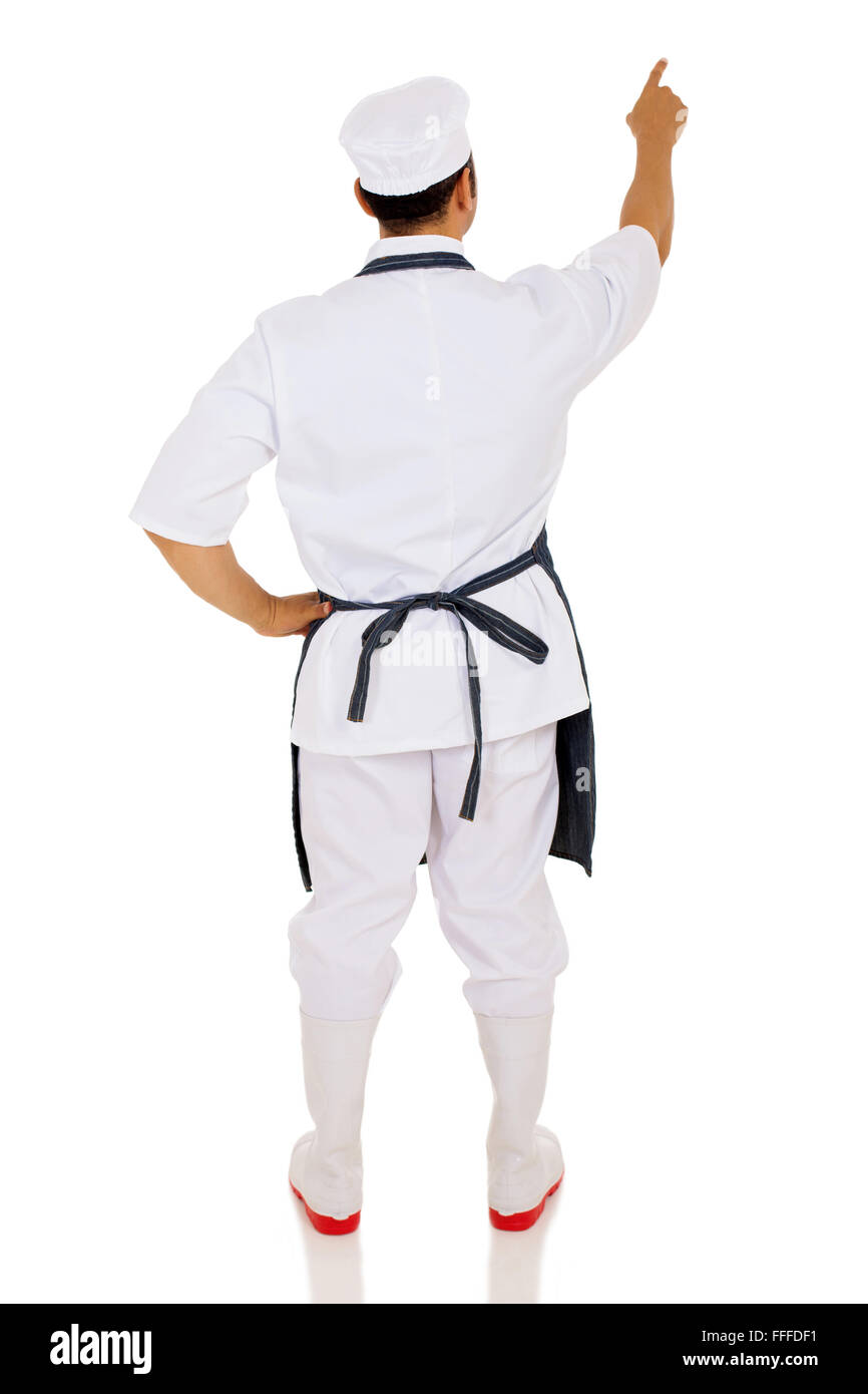 back view of male butcher pointing empty space Stock Photo - Alamy