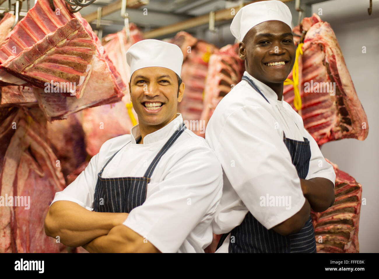 confident butchers standing arms crossed in butchery Stock Photo - Alamy