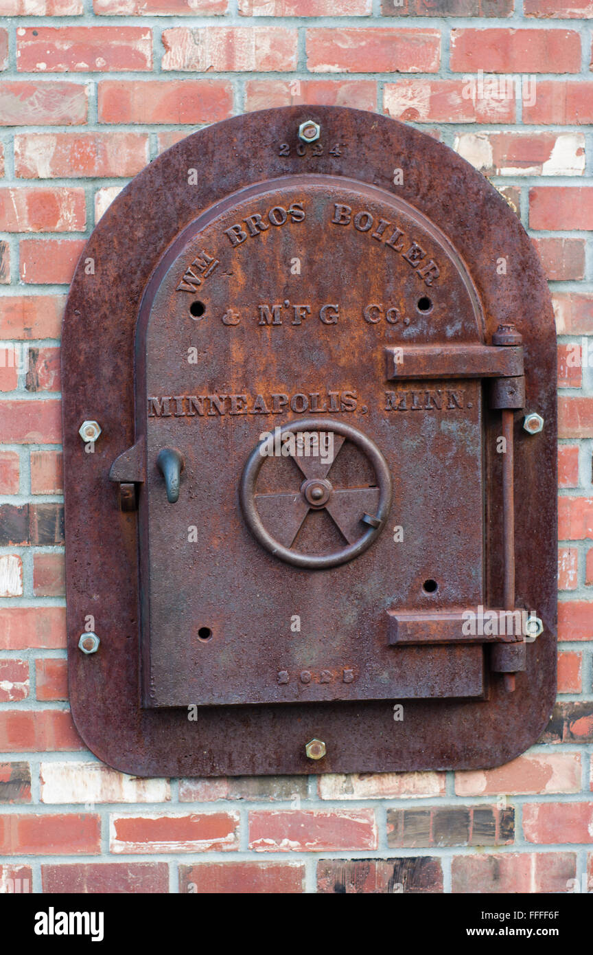 Cast iron boiler door in an educational display. Bend, Oregon Stock ...