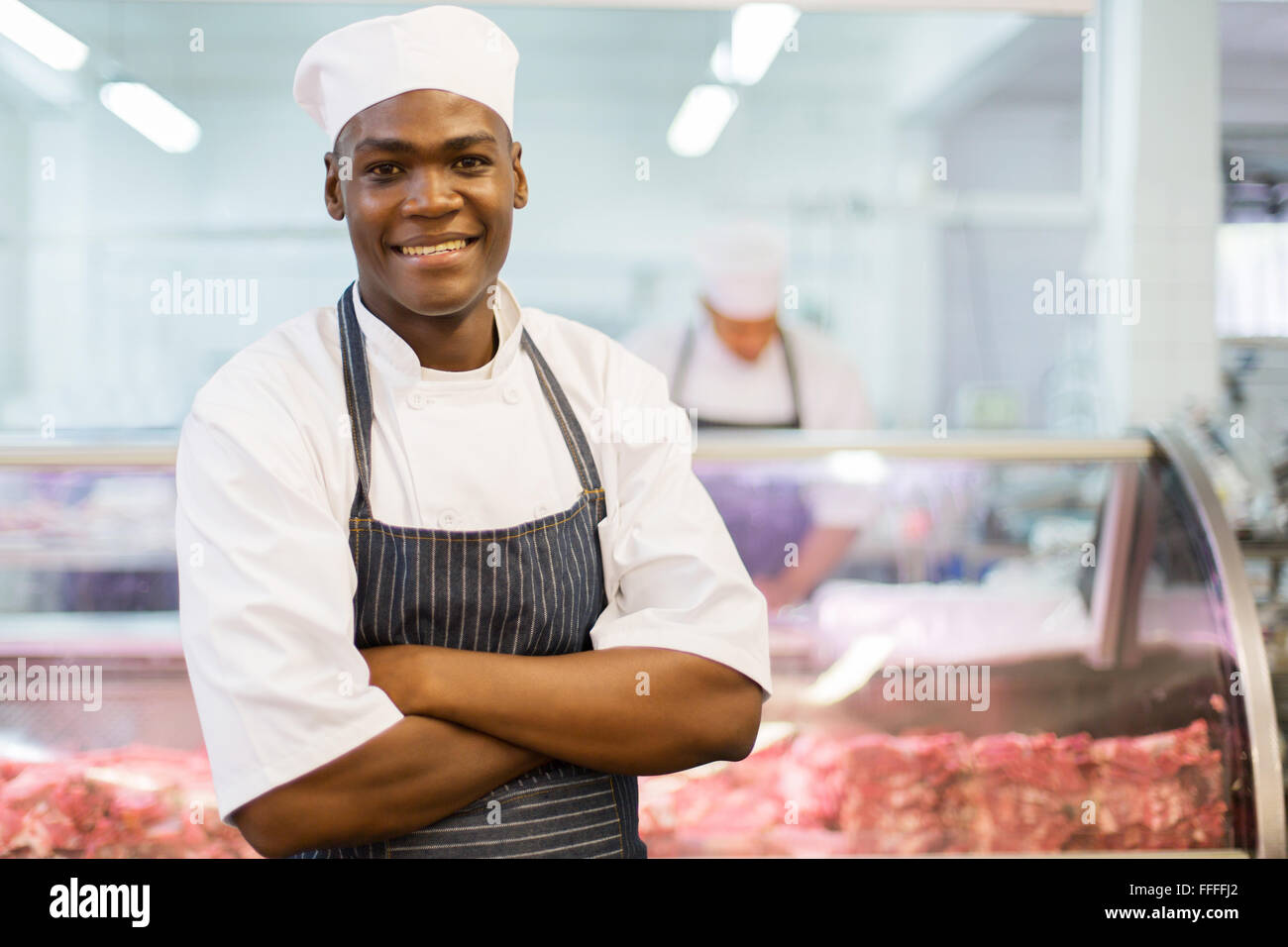 handsome young African American butcher in butchery Stock Photo - Alamy