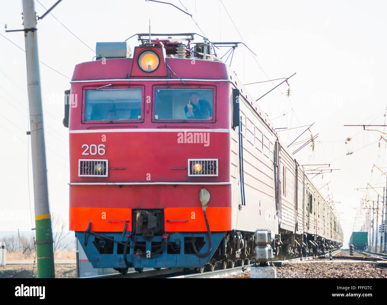 The train driver shows middle finger Stock Photo - Alamy