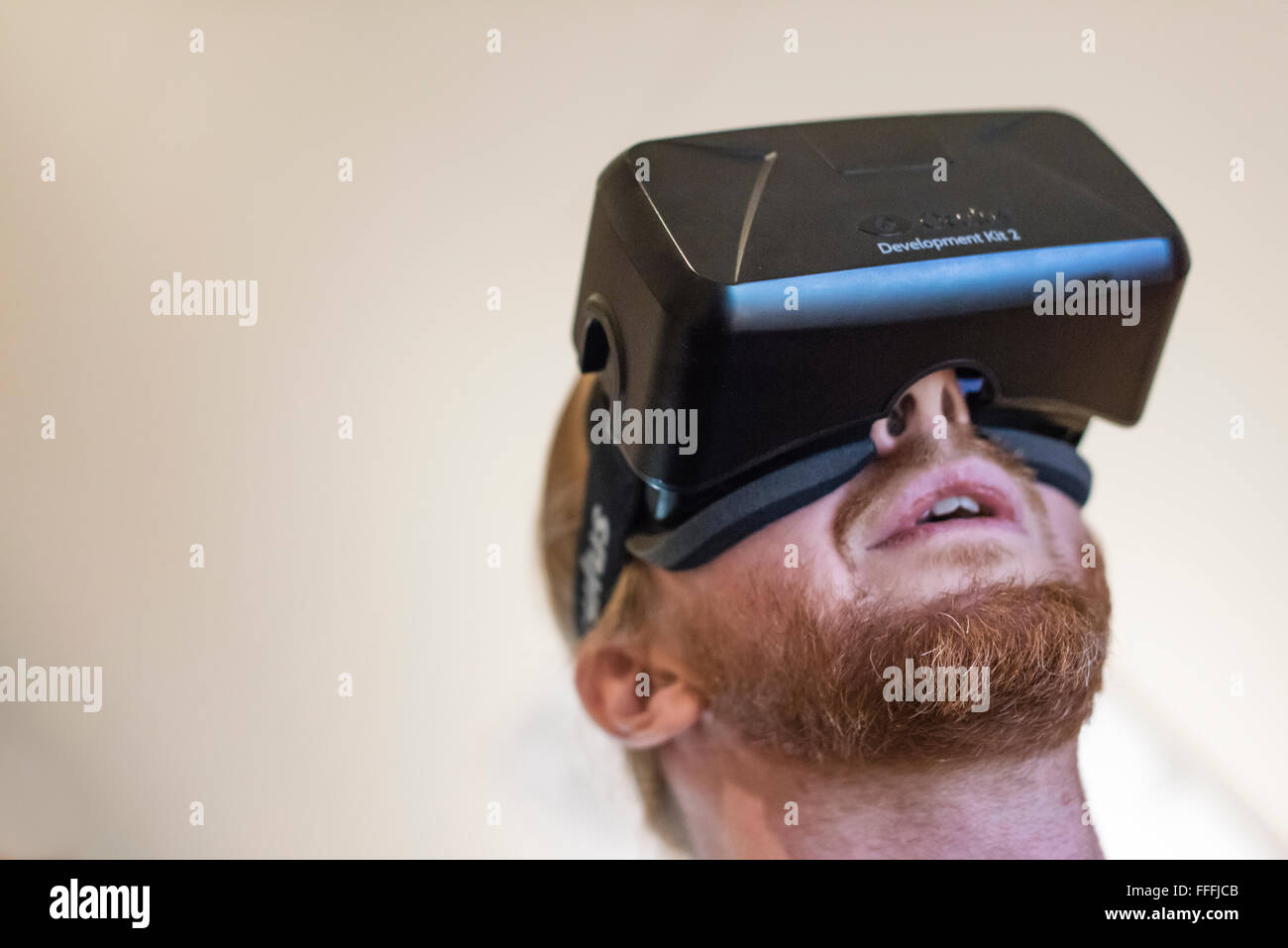 A man (Caucasian ethnicity) is wearing Oculus Rift Development Kit 2 ...