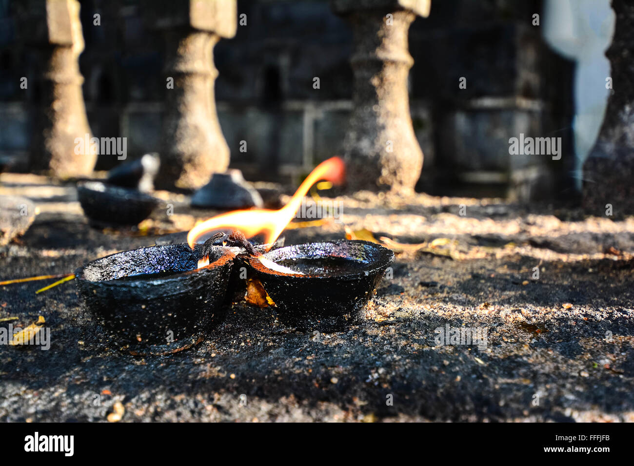 Traditional Clay Lamps Lit At The Buddhist Temple In Sri Lanka Stock ...