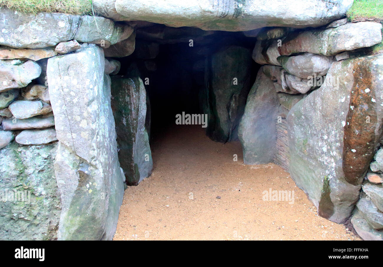 Looking inside main chamber of West Kennet neolithic long barrow ...