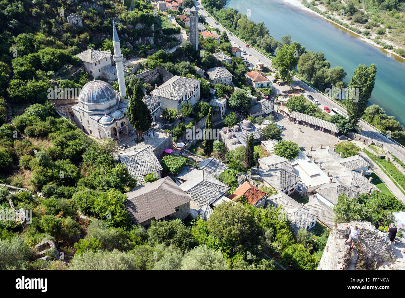 Hajji Alija Mosque and Sahat Kula clock tower in Pocitelj village over ...