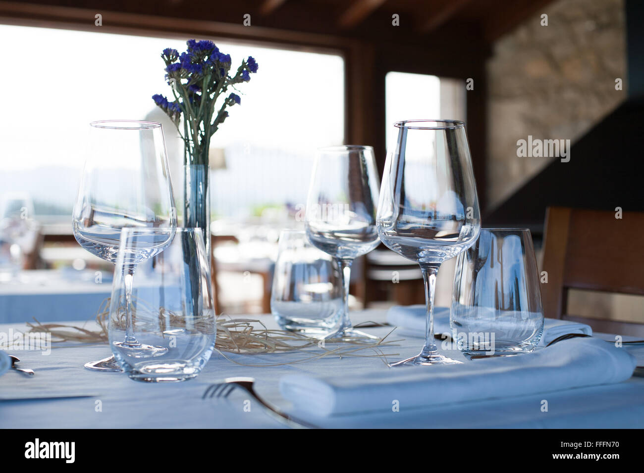 lonely table in elegant luxury restaurant interior with white ...