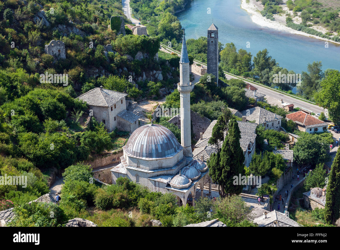Hajji Alija Mosque and Sahat Kula clock tower in Pocitelj village over ...