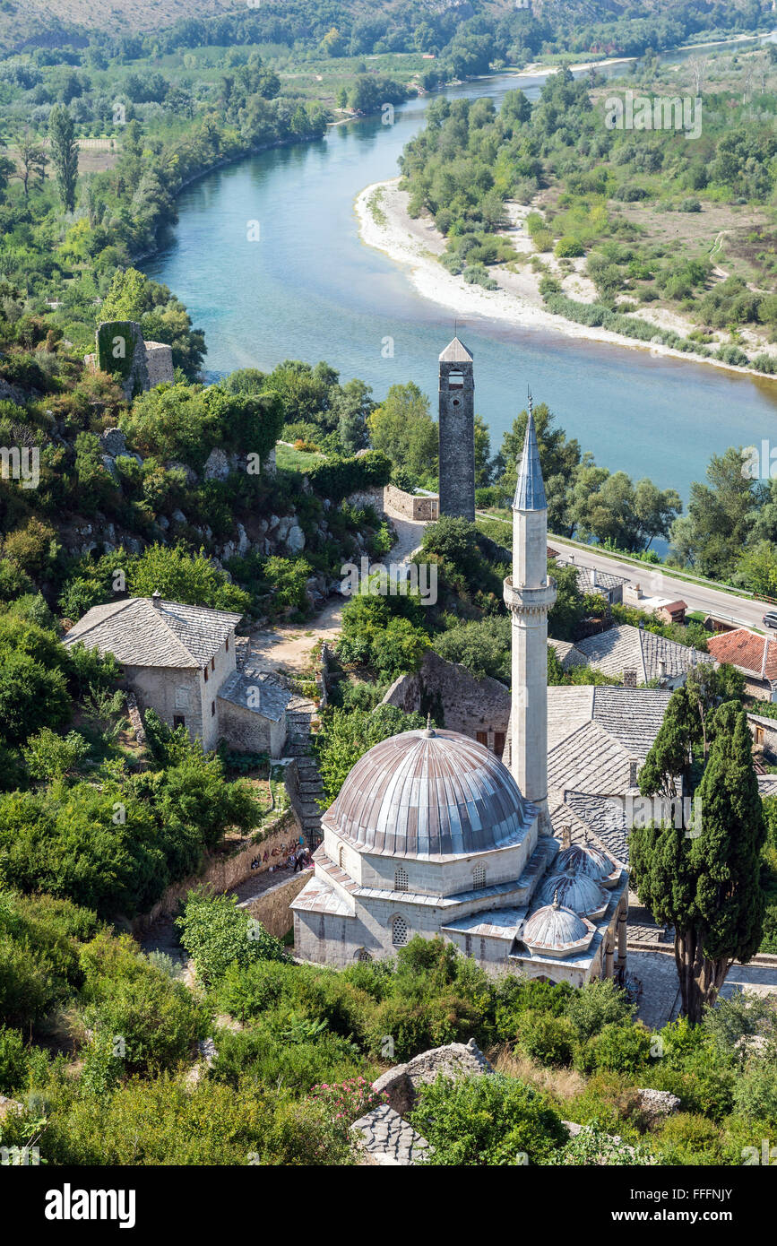 Hajji Alija Mosque and Sahat Kula clock tower in Pocitelj village over ...