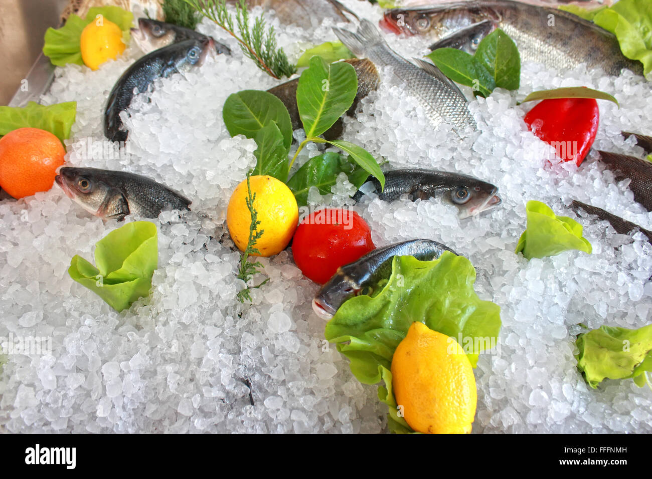 Fresh fishes and parsley on ice hi-res stock photography and images - Alamy