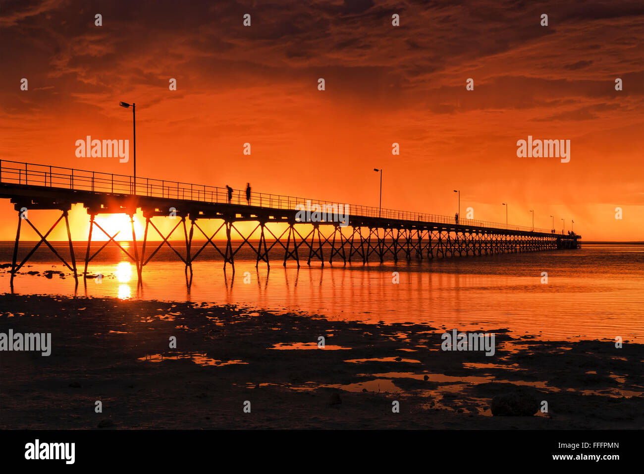 low point view of wooden historic jetty in Ceduna, South Australia ...