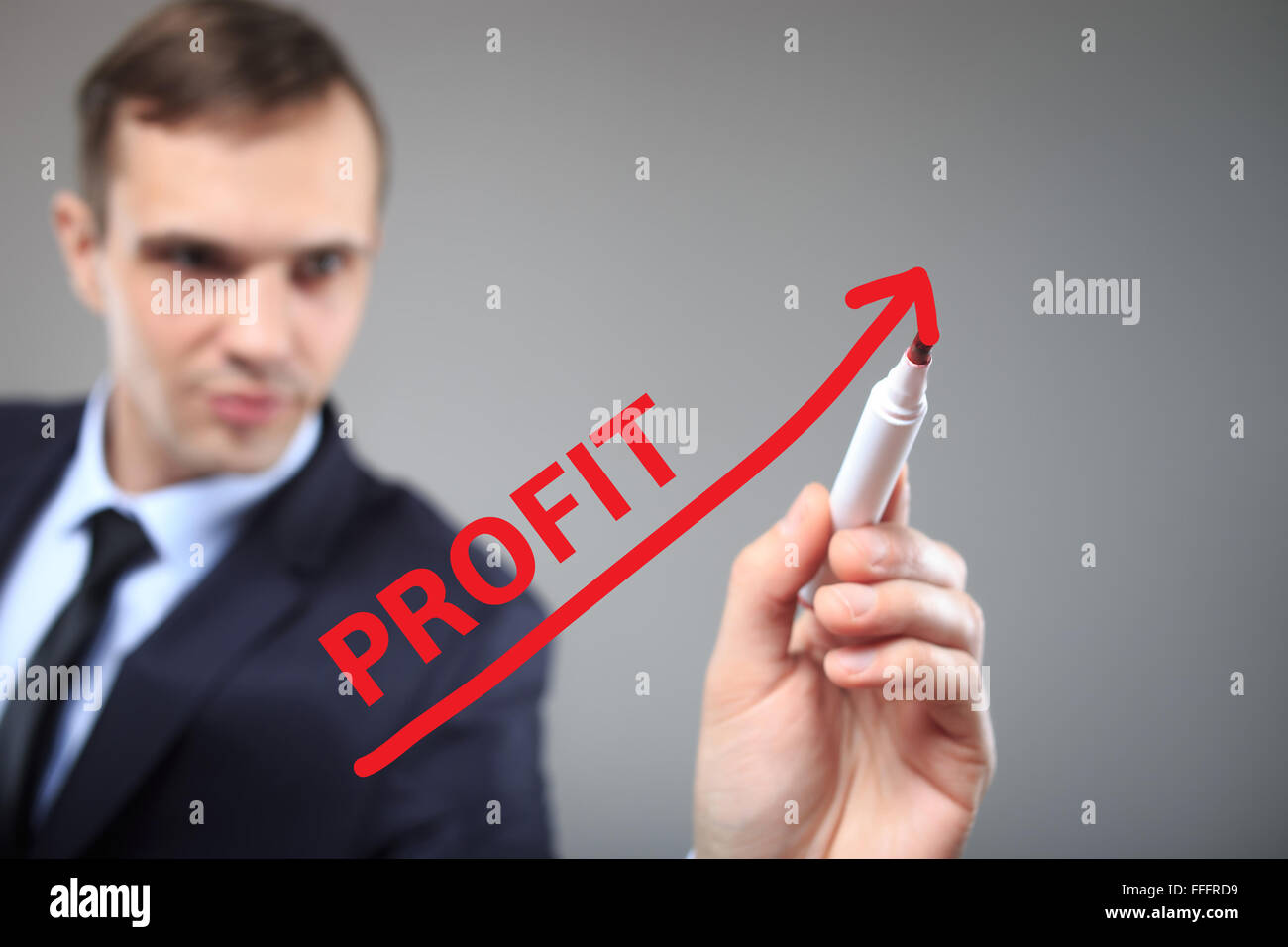 Businessman holding positive arrow hi-res stock photography and images ...