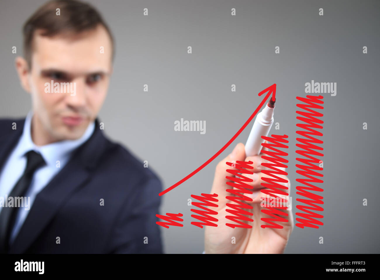 Businessman highlighting business growth on a graph. profit Stock Photo ...