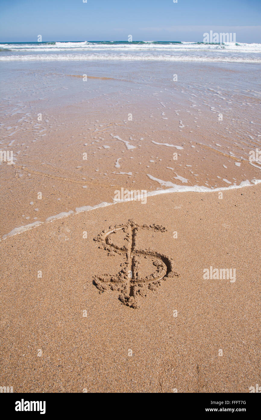 ocean water flood Dollar symbol written on brown sand ground beach ...