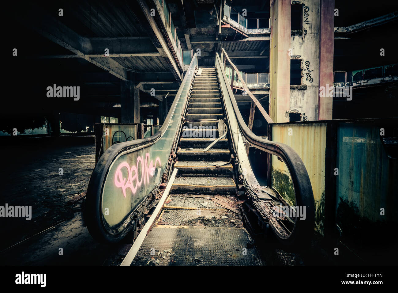 Dramatic view of damaged escalators in abandoned building. Apocalyptic ...