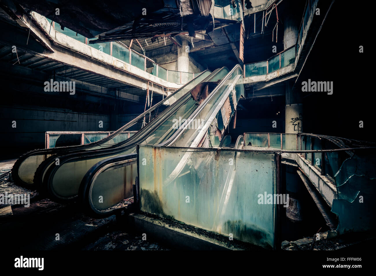 Dramatic view of damaged escalators in abandoned building. Apocalyptic ...