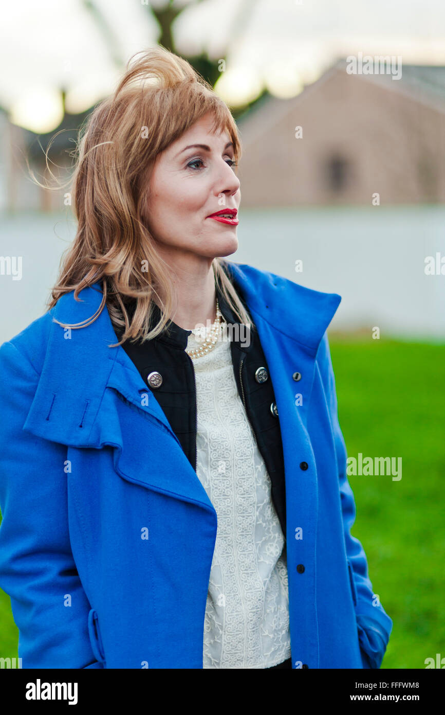 Talking behind woman back hi-res stock photography and images - Alamy
