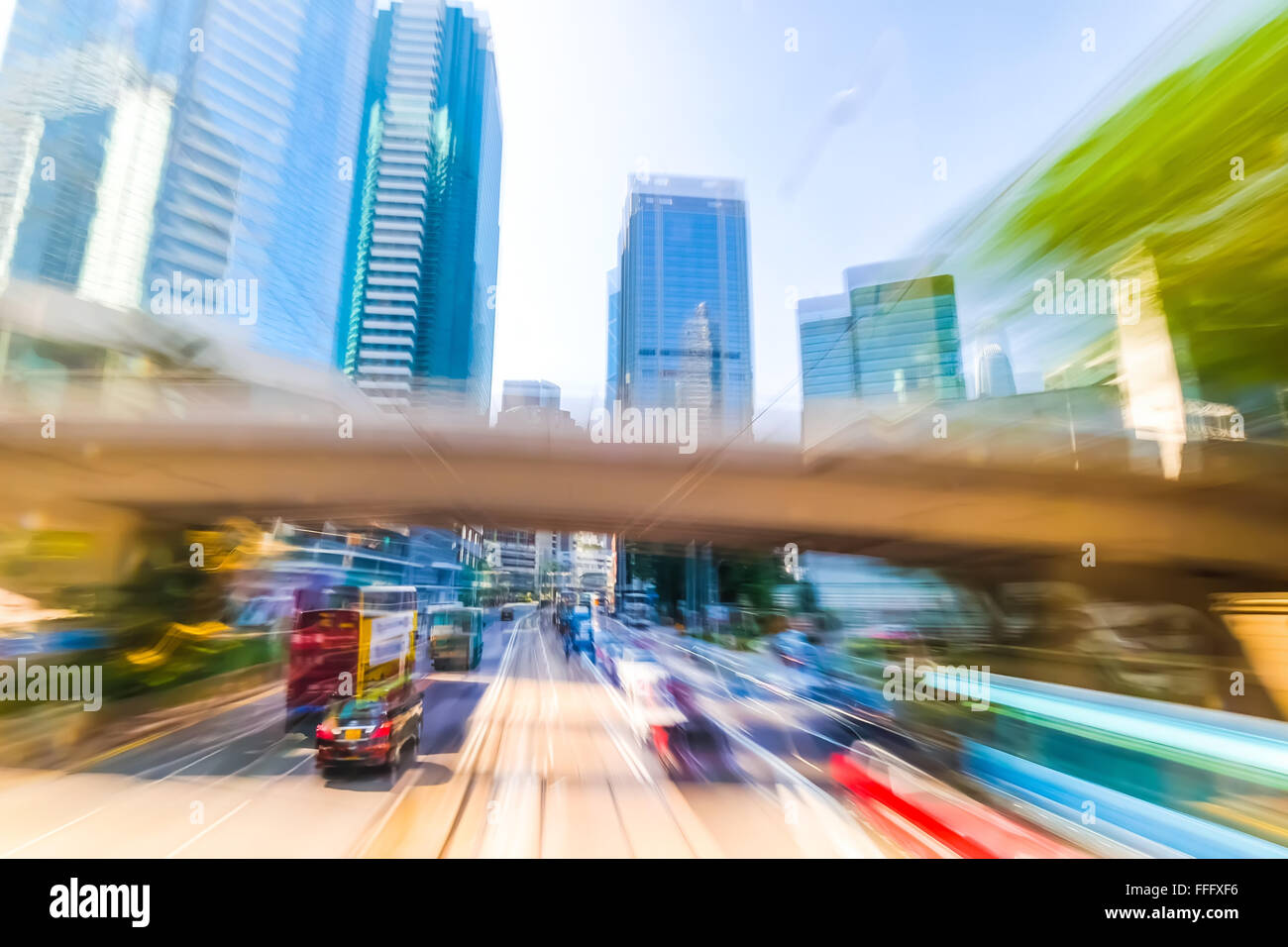 Moving through abstract modern city street with skyscrapers. Hong Kong ...