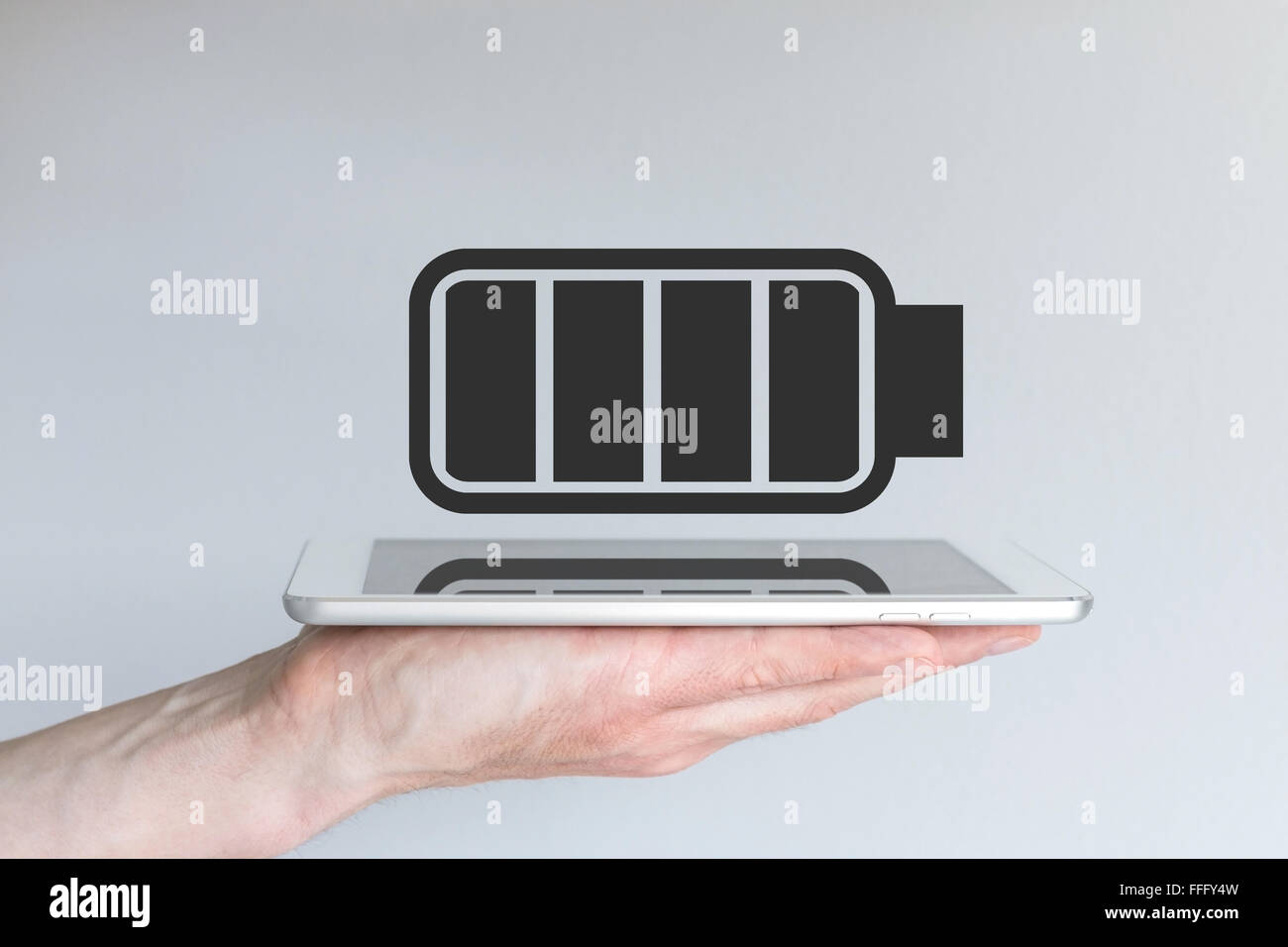 Concept of battery life for mobile devices. Hand holding modern smart ...