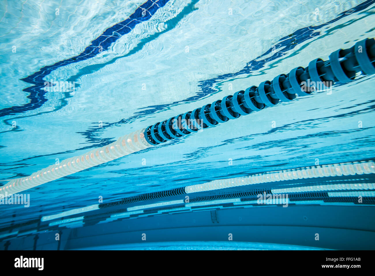 Swimming pool under water background Stock Photo - Alamy