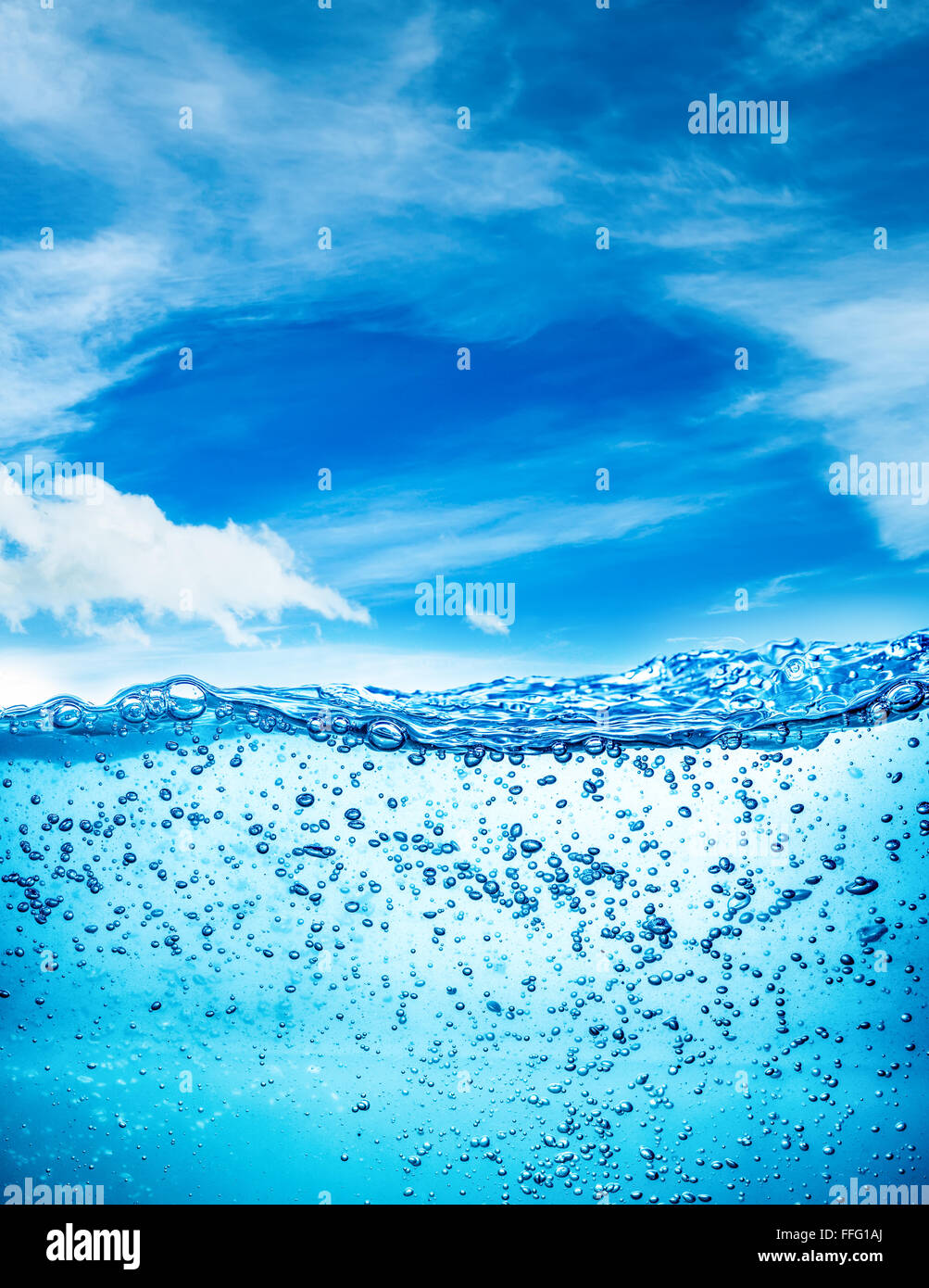 Many air bubbles in water close up, abstract water wave with bubbles on ...