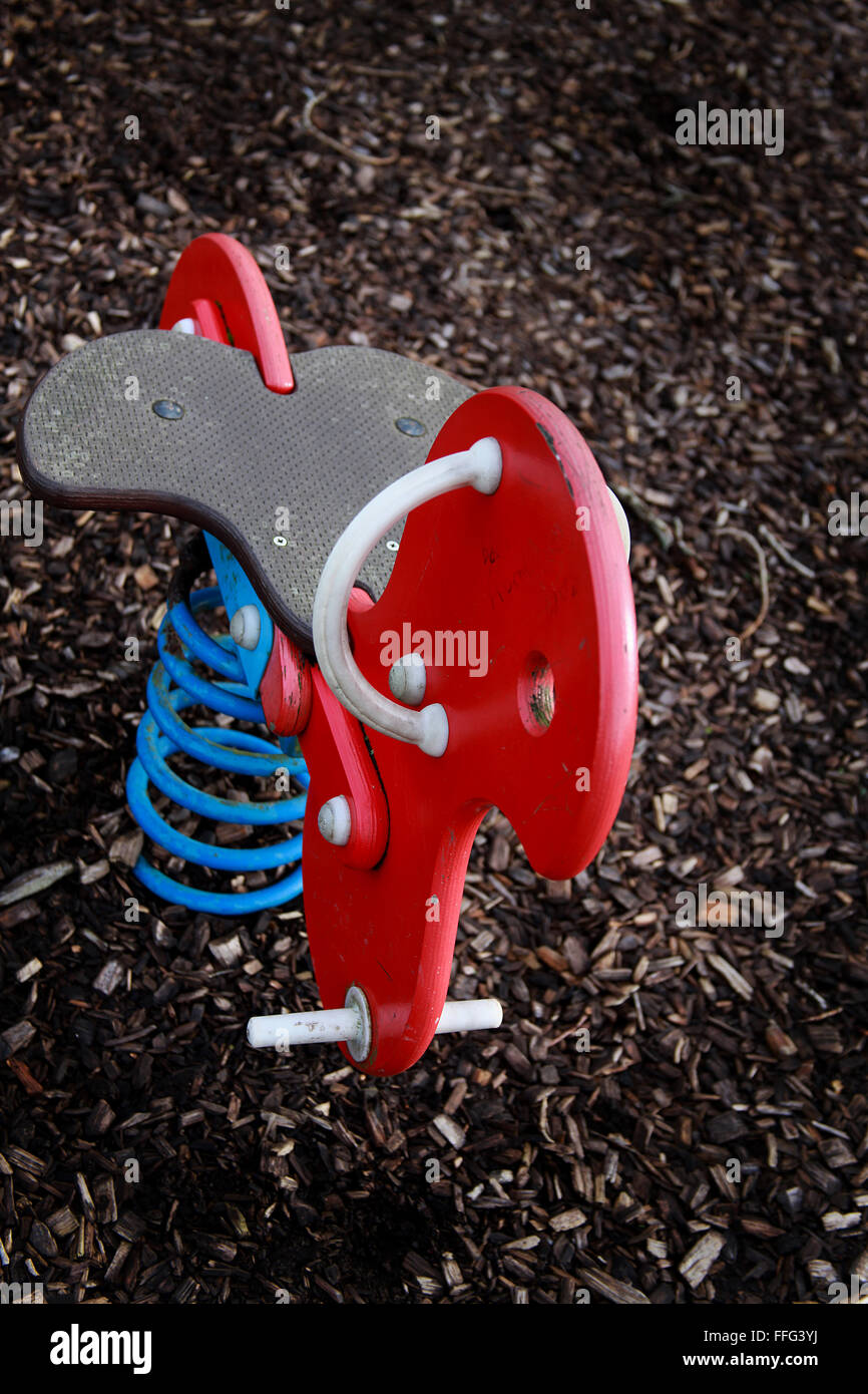 Children's spring rocking ride in a play park standing empty Stock ...