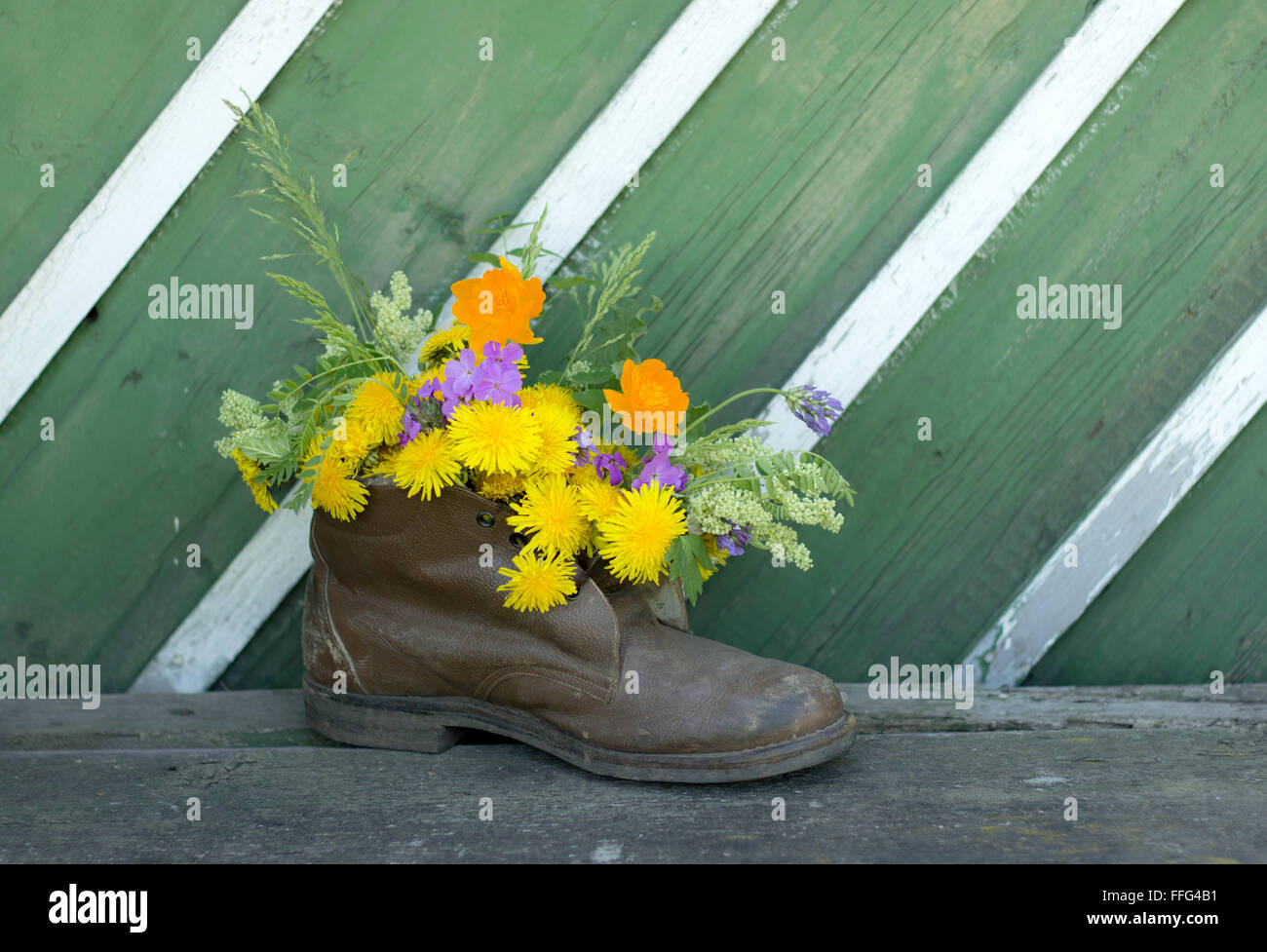 Boots and flower bouquet hi-res stock photography and images - Alamy
