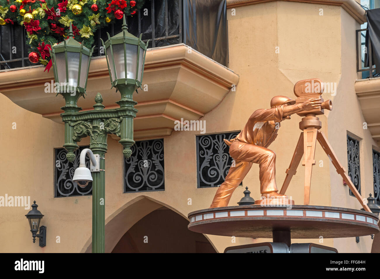 Film Cameraman Statue, Universal Studios, Singapore Stock Photo - Alamy