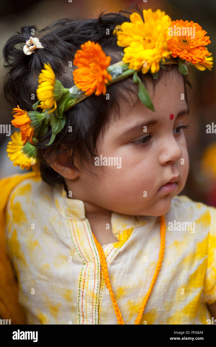 Dhaka, Bangladesh. 13th Feb, 2016. Bangladeshi child wear flower ...