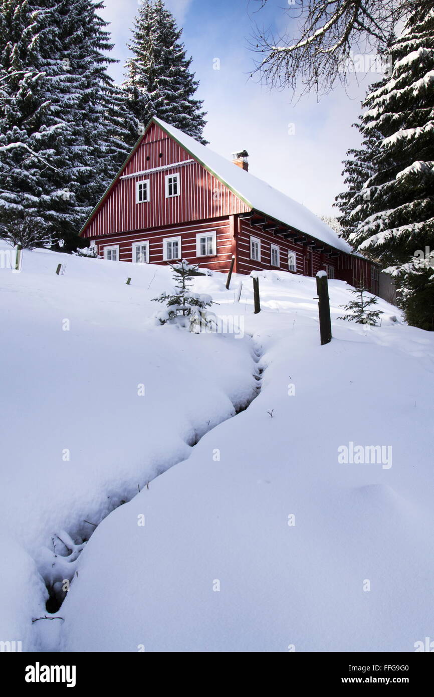 Red wooden cabin in a frosty snowy country in sunny winter day Stock ...