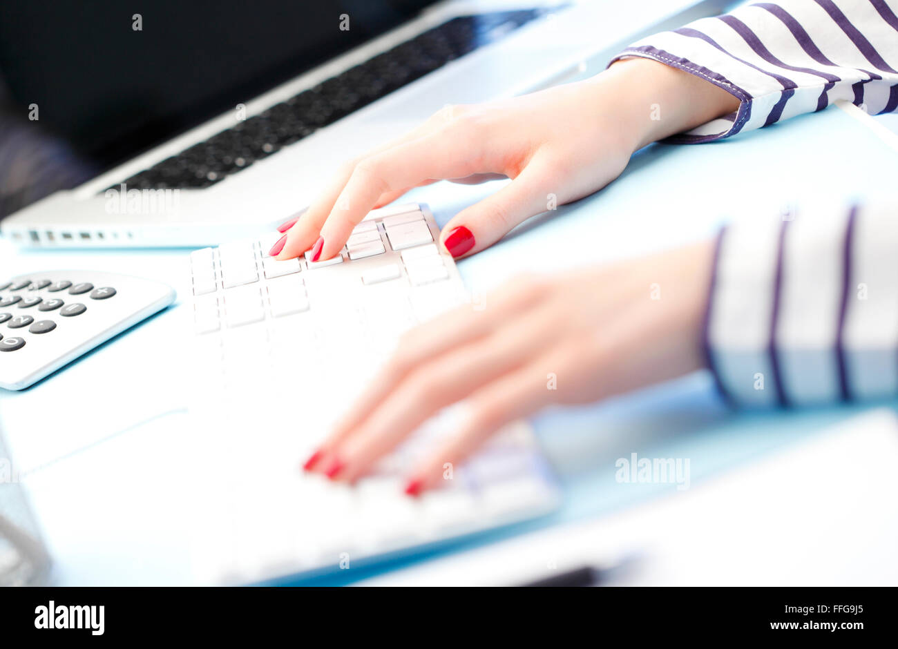 Close-up portrait of red nails sales woman working at office. Young ...