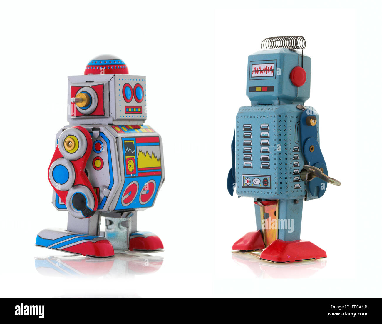 Two Retro Tin Clockwork Robot on a White Background Stock Photo - Alamy