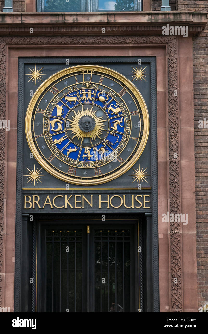 Astronomical clock above the entrance of the Bracken House designed by ...