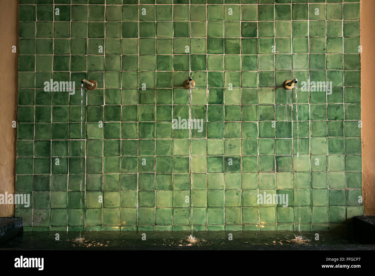 Fountain with green tile Stock Photo - Alamy