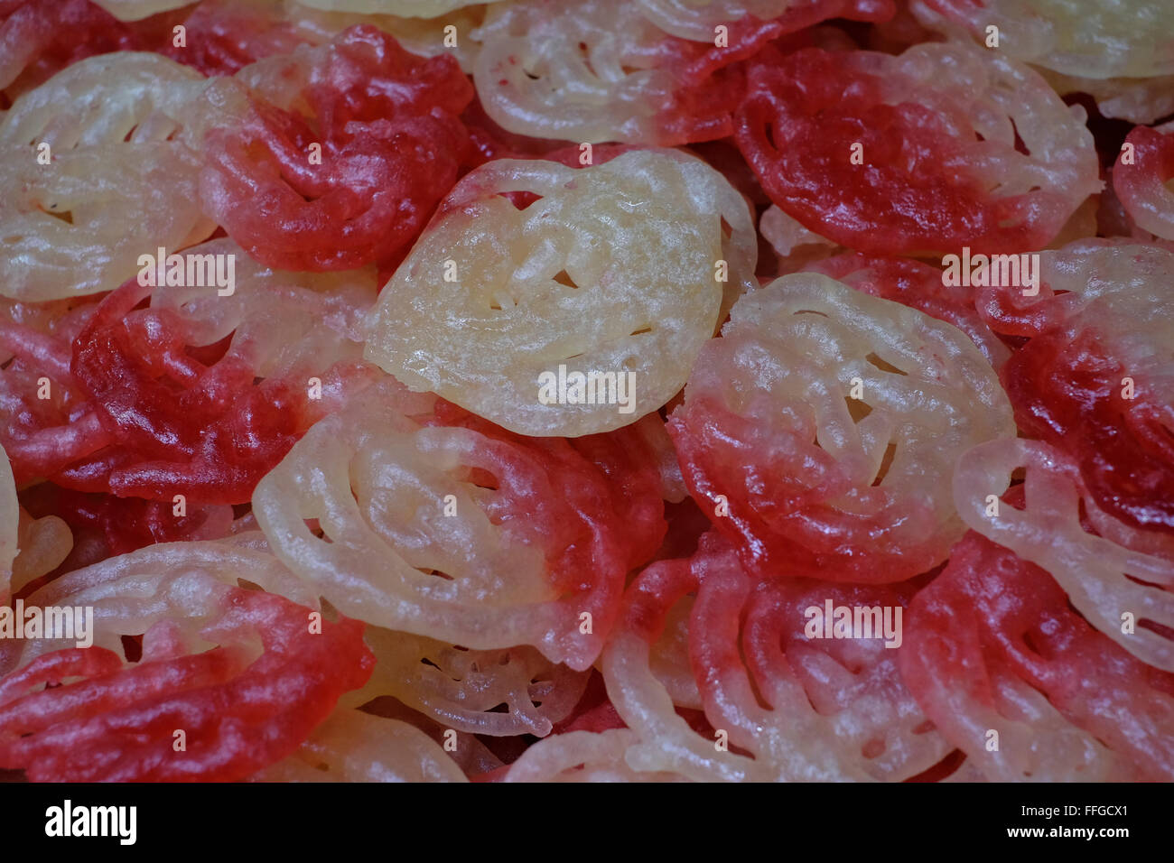 Pile of Mshabak or Mushabbak deep fried dough soaked in sweet syrup for ...