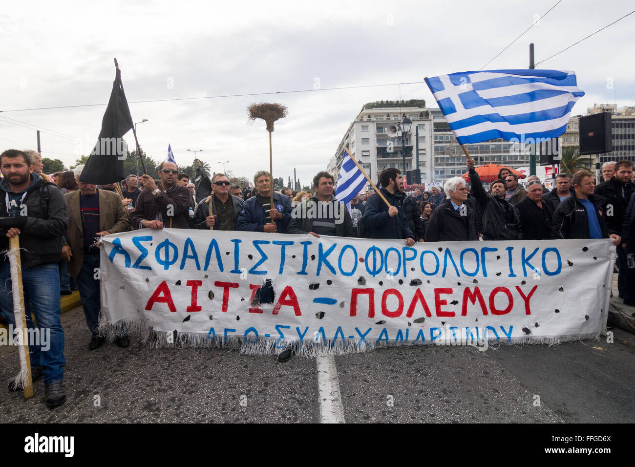 Athens, Greece. 13th Feb, 2016. Protesters with placards and flags are ...