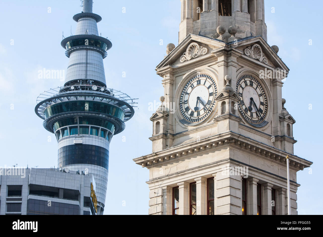 The Town Hall Clock Tower on Queen Street and modern Sky Tower ...