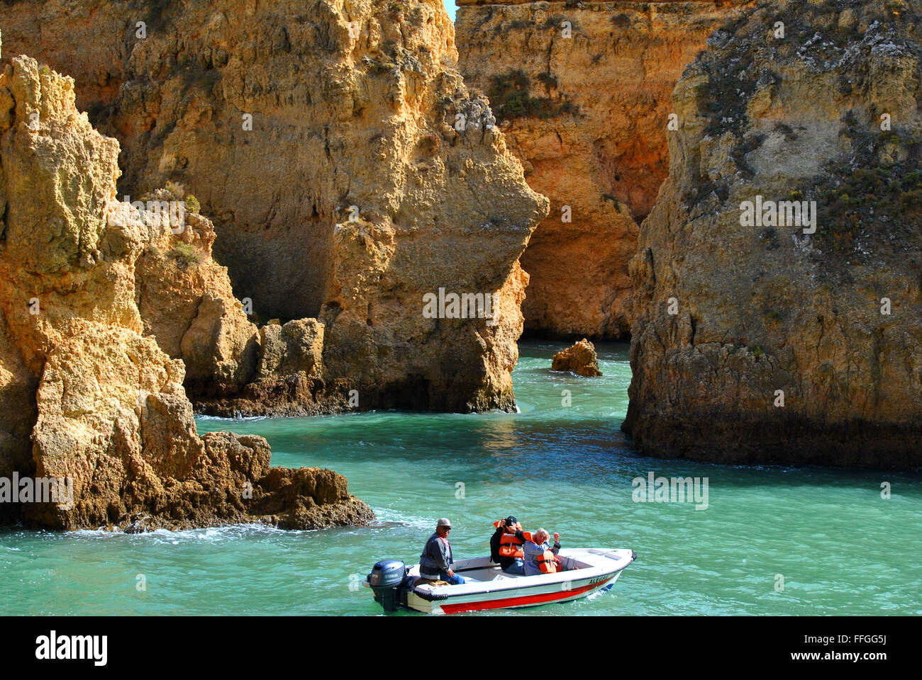 Tourists enjoying the view of the spectacular rock formations from a ...