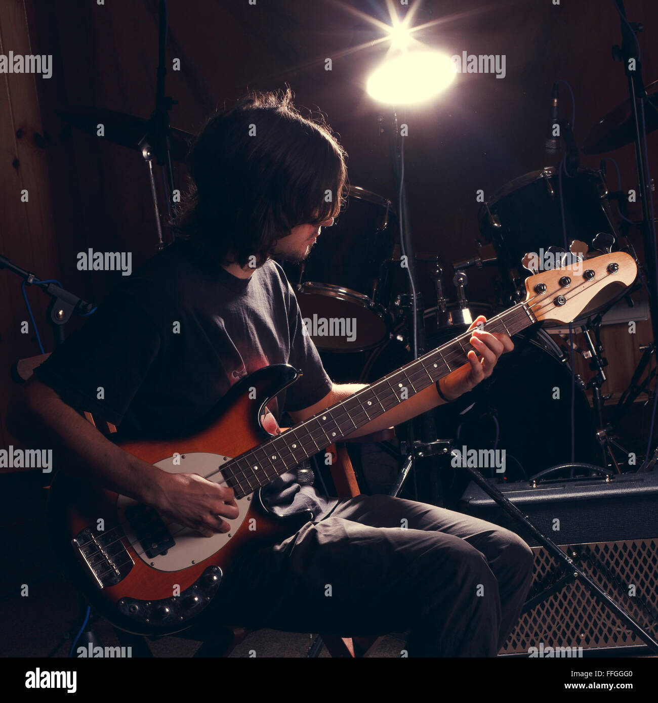 guy playing bass guitar Stock Photo - Alamy