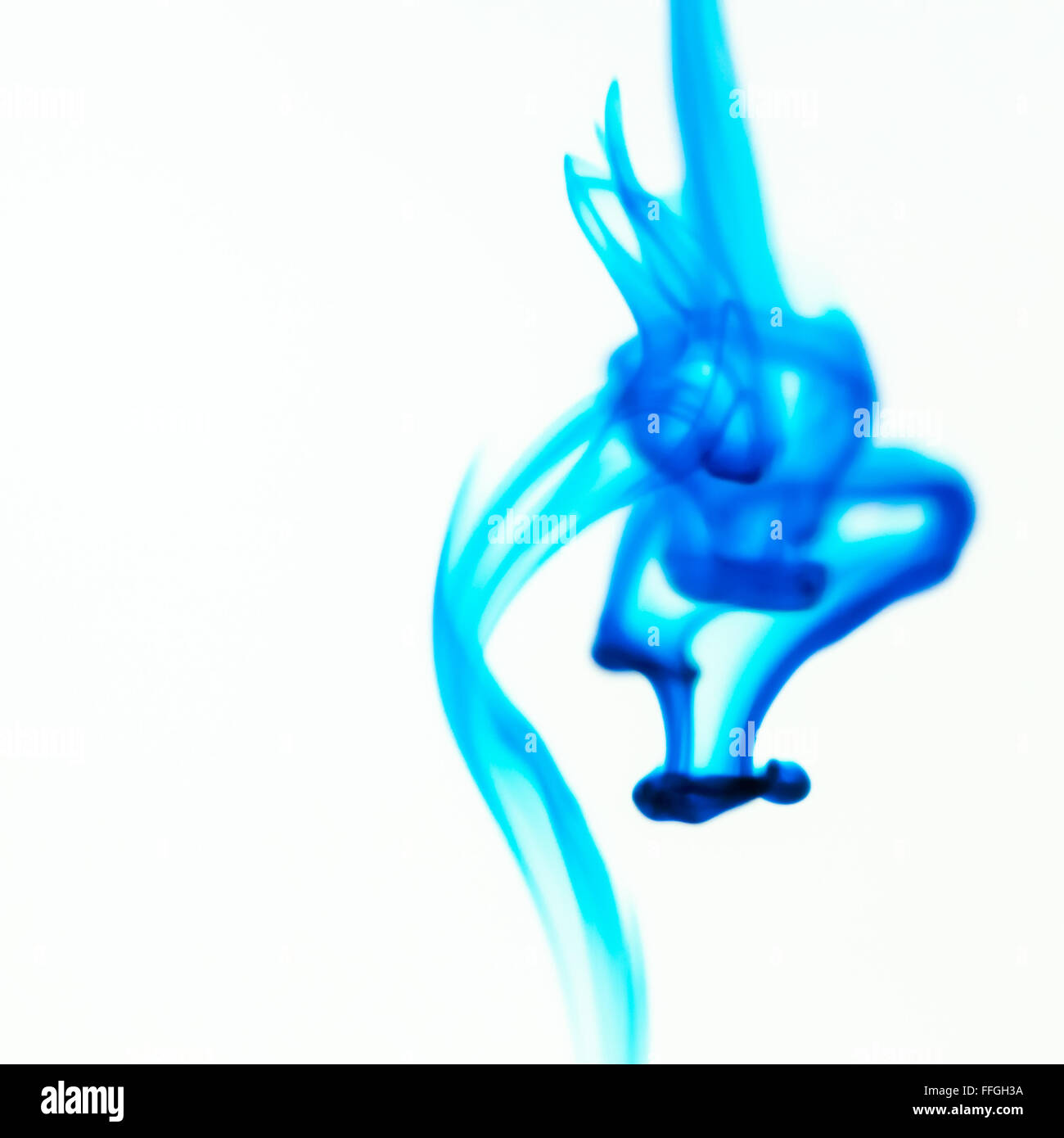 Abstract image of a plume of blue liquid on white background Stock ...