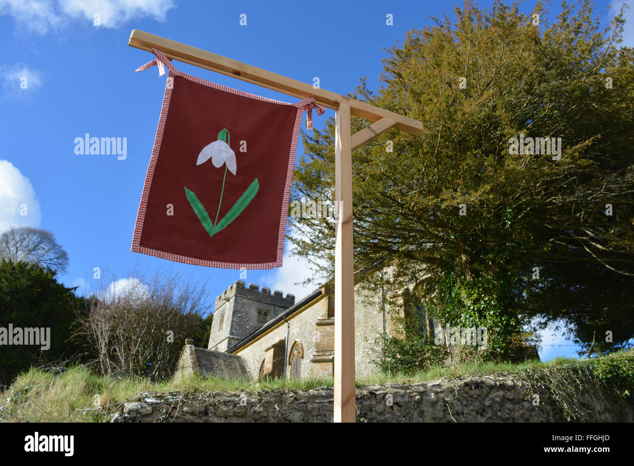 Snowdrop banner hanging outside the village hall in the village of ...