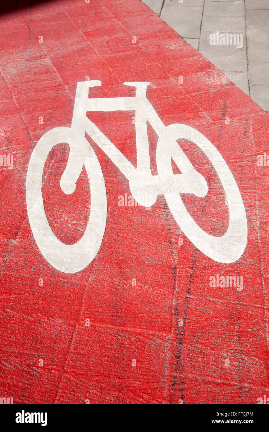 Red Bike Lane Symbol in Brussels, Belgium Stock Photo - Alamy