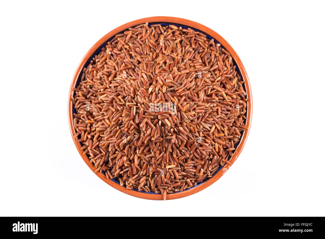 Bowl of Red Cargo Rice. Shot on white background Stock Photo - Alamy