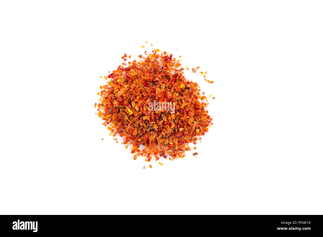 Crushed red chili pepper on white background Stock Photo - Alamy